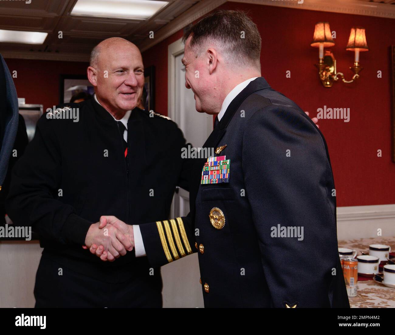 221106-N-RC359-1035 SAGAMI WAN (Nov. 6, 2022) Adm. Mike Gilday, left ...