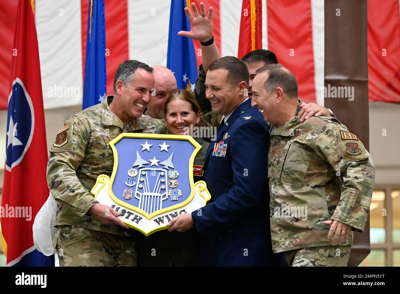 Col. Todd Wiles, in dress blues, the former commander of the 118th Wing ...