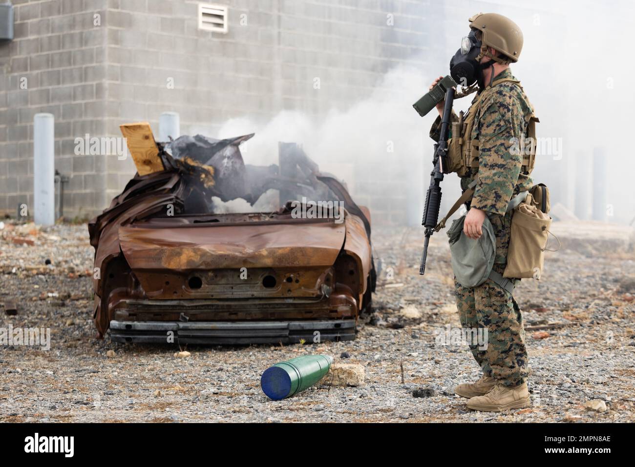 A U.S. Marine Corps explosive ordnance disposal technician with ...