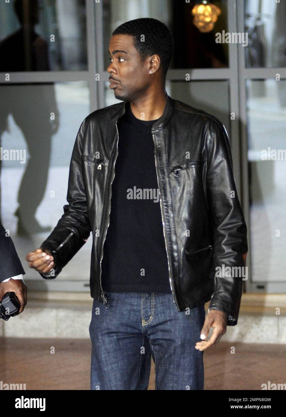Actor, comedian and producer Chris Rock leaves his London hotel. Rock ...