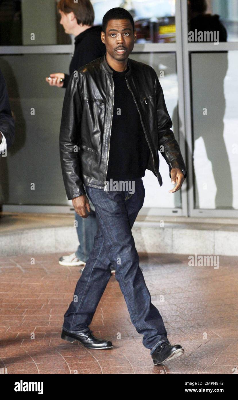 Actor, comedian and producer Chris Rock leaves his London hotel. Rock ...