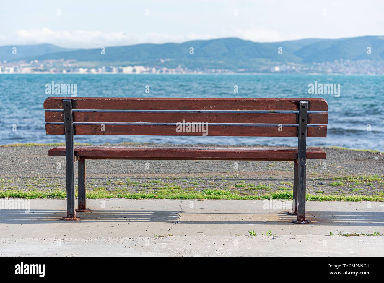 Bench on the background of the sea Stock Photo - Alamy