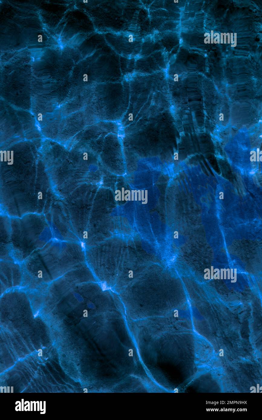Abstract photo of the glow of the water surface with the reflection of ...