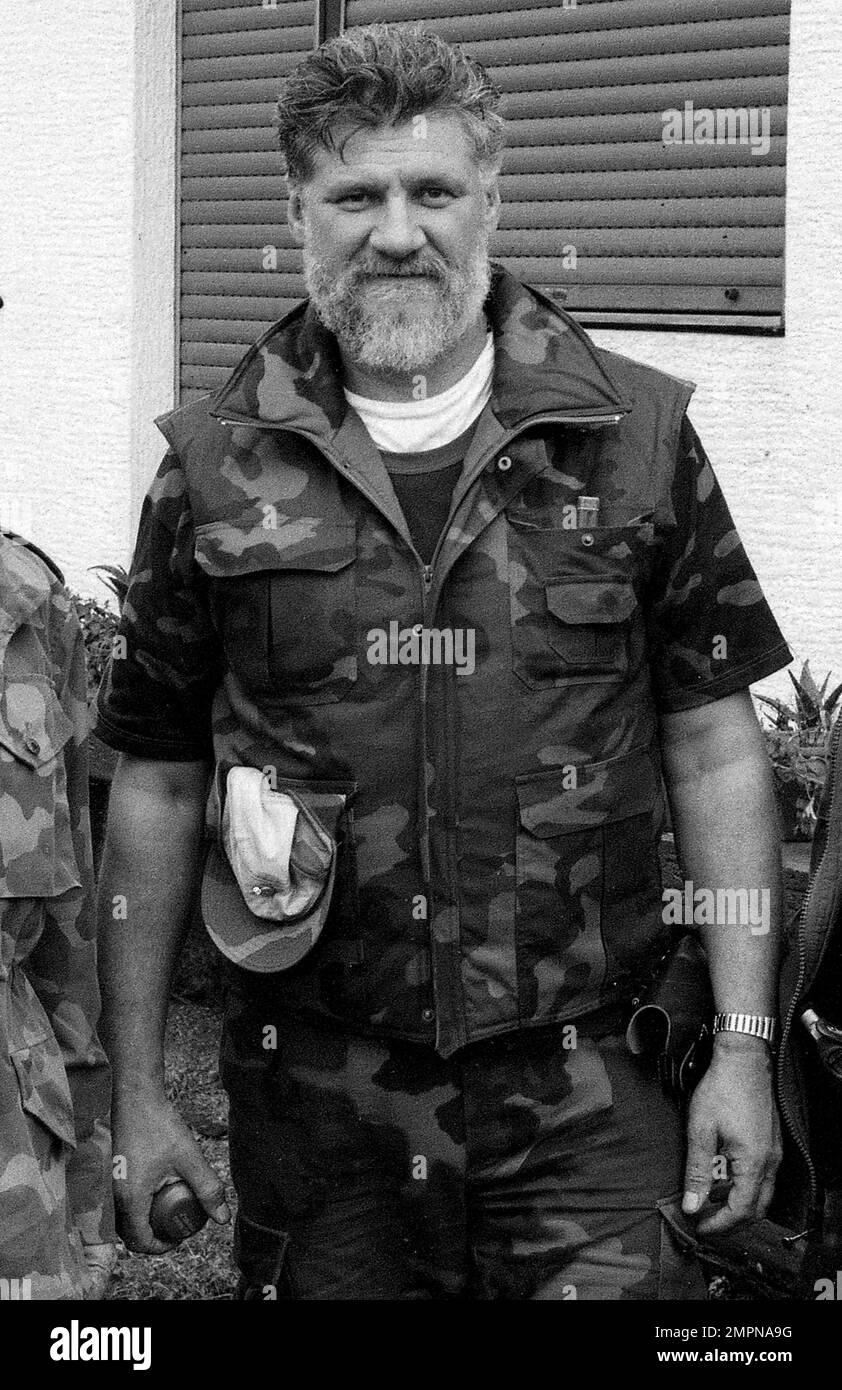 In this Sept. 1991 photo, Slobodan Praljak holds a hand-grenade as he ...
