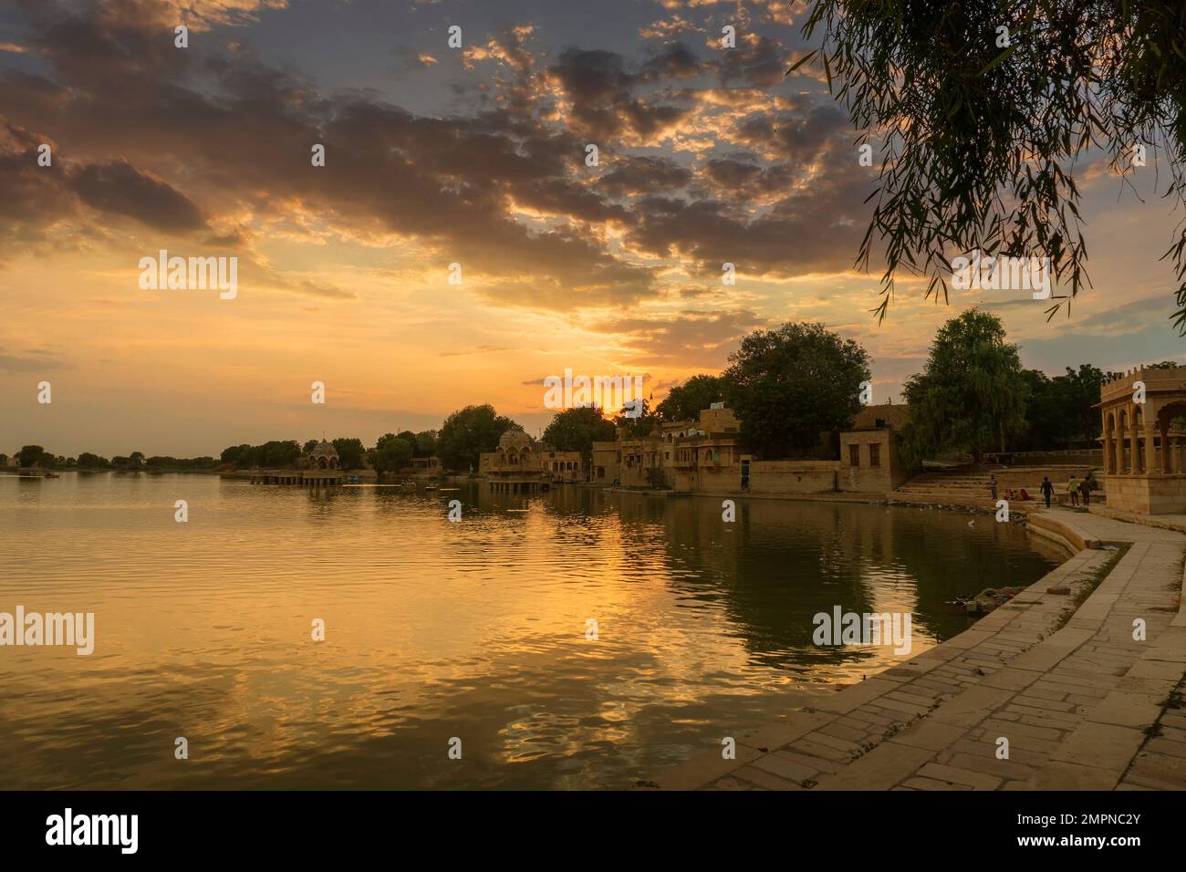 Spectacular sunset at Gadisar lake,Jaisalmer,Rajasthan, India. Setting ...