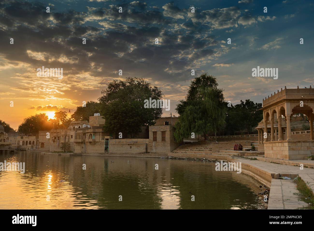 Spectacular sunset at Gadisar lake,Jaisalmer,Rajasthan, India. Setting ...