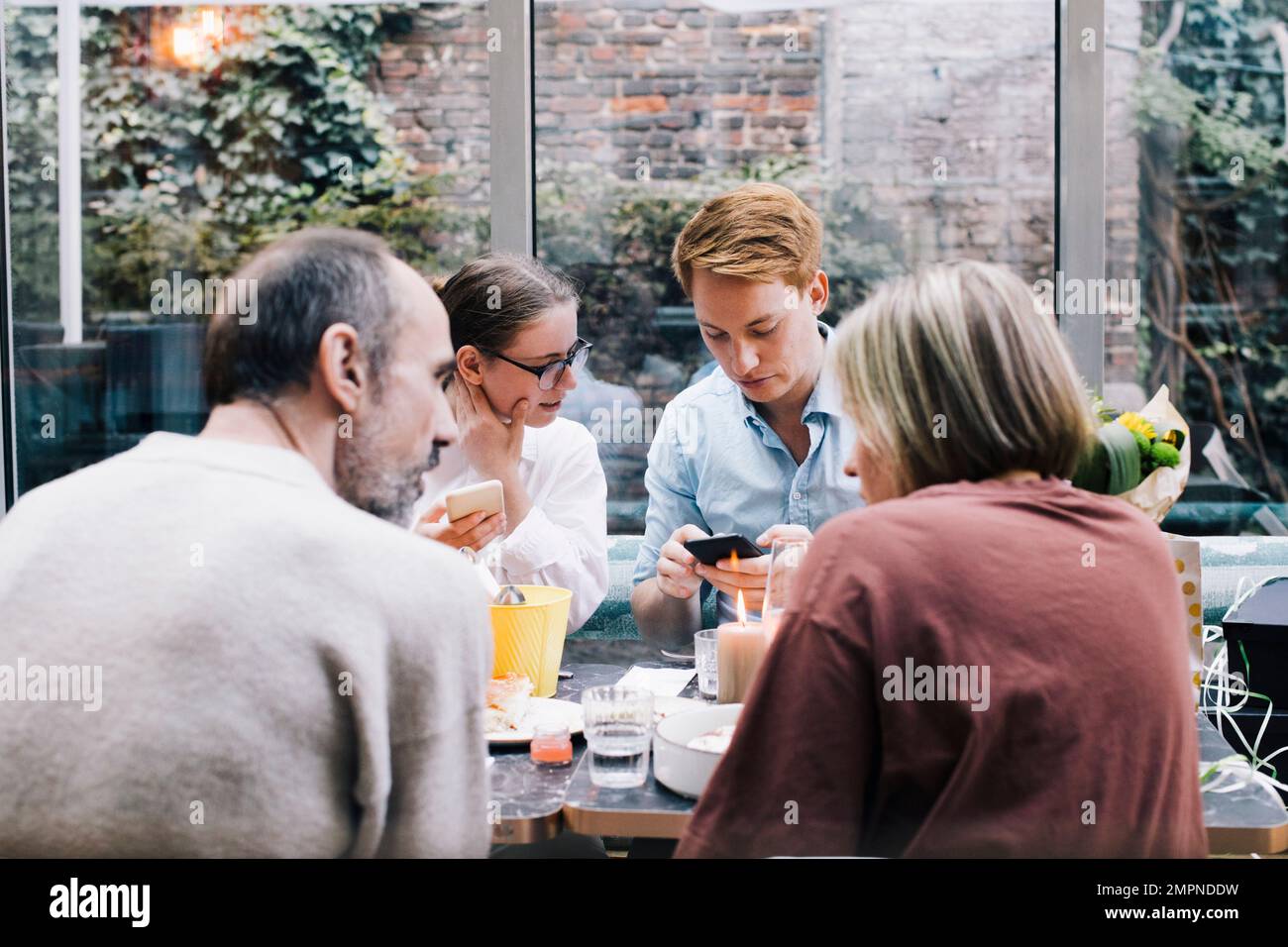Siblings sharing birthday party hi-res stock photography and images - Alamy