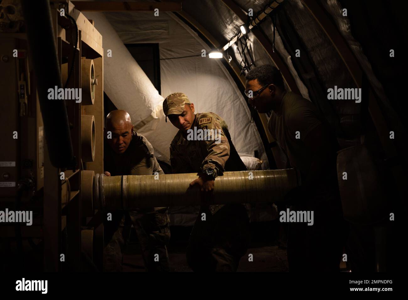 U.S. Air Force Airmen, assigned to the 1st Special Operations Civil ...