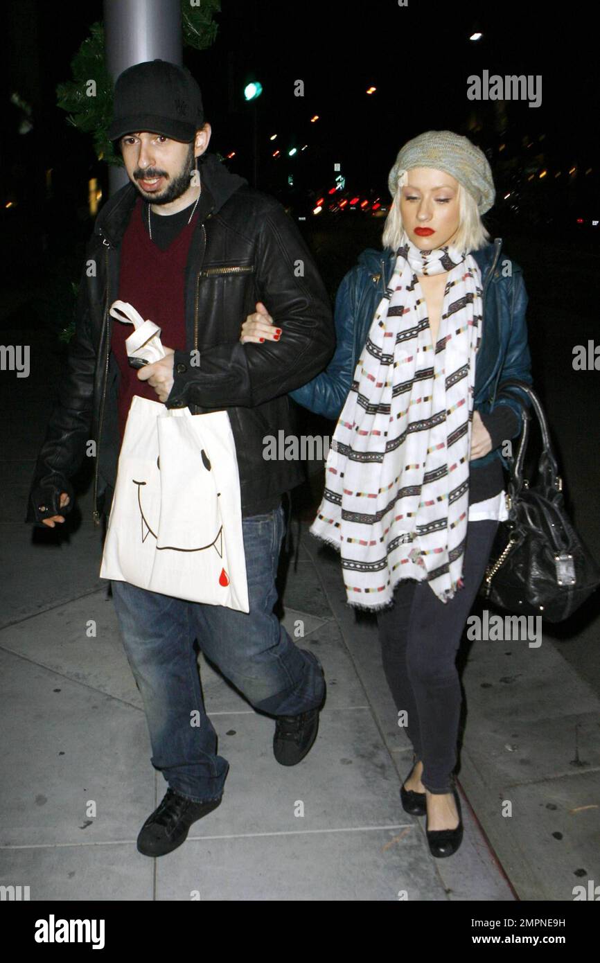 Christina Aguilera looks sullen as she leaves dinner at La Scala with ...