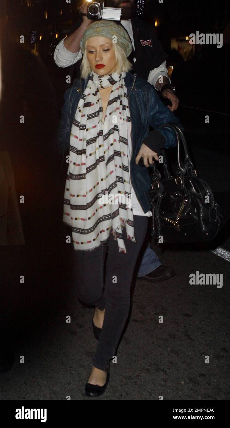 Christina Aguilera looks sullen as she leaves dinner at La Scala with ...