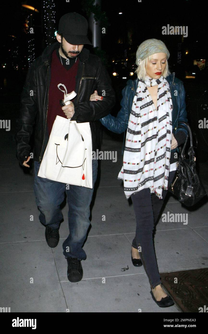 Christina Aguilera looks sullen as she leaves dinner at La Scala with ...
