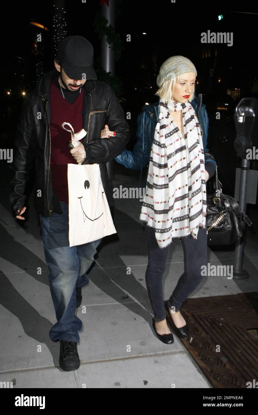 Christina Aguilera looks sullen as she leaves dinner at La Scala with ...