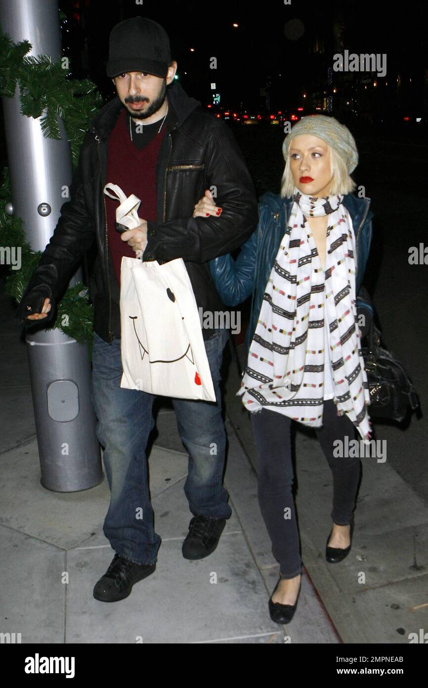 Christina Aguilera looks sullen as she leaves dinner at La Scala with ...