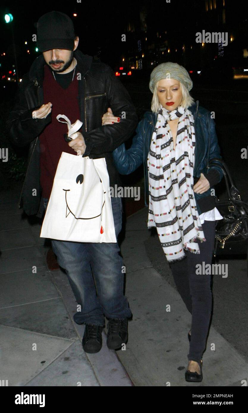 Christina Aguilera looks sullen as she leaves dinner at La Scala with ...