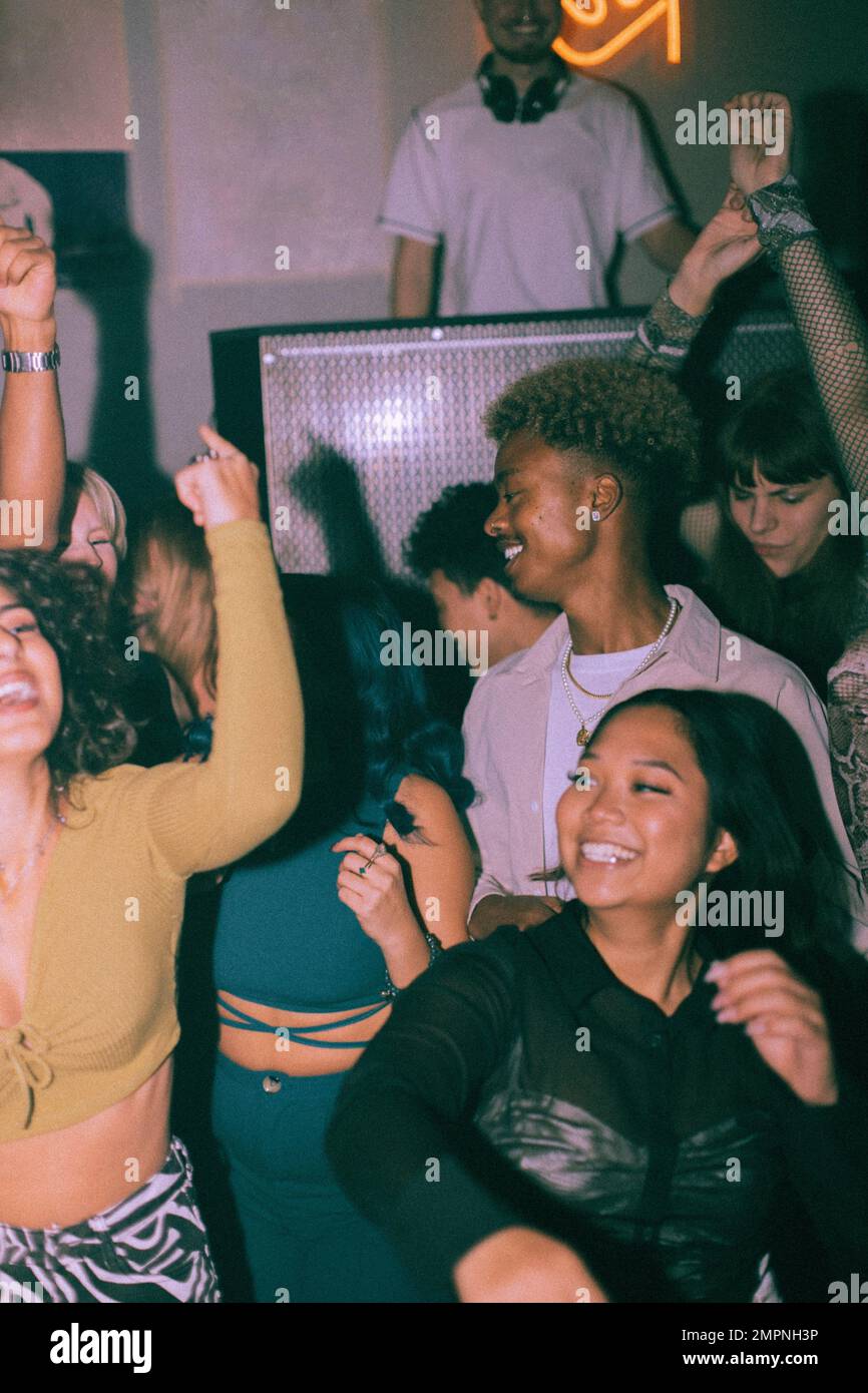 Cheerful multiracial women dancing party hi-res stock photography and ...