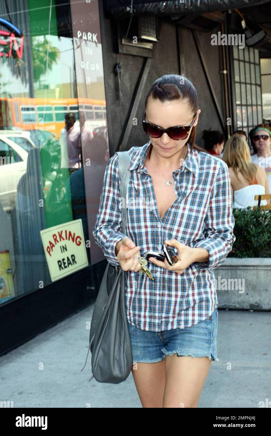 Actress Christina Ricci smiles for cameras as she strolls in West ...