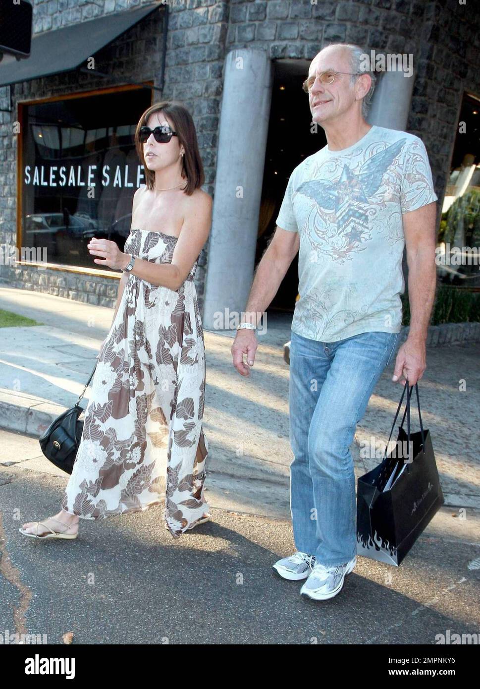 Actor Christopher Lloyd gets in some shopping with a female friend on ...