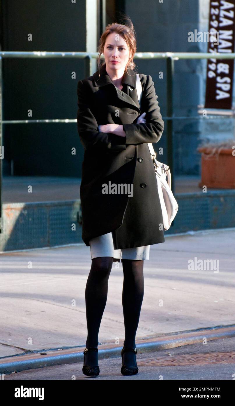 Supermodel Christy Turlington looks chilly as she waits for a taxi in ...