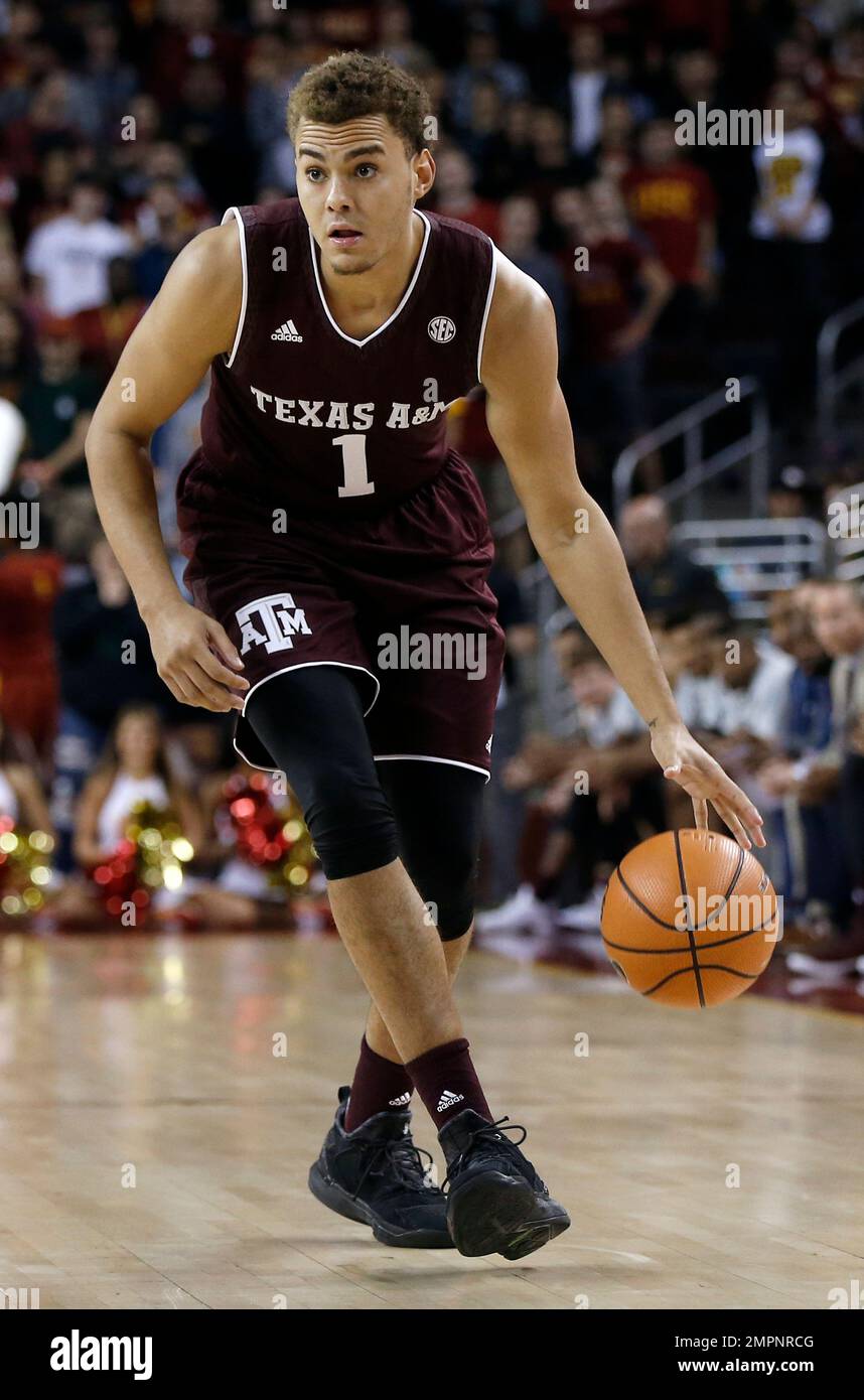 Texas A&M forward DJ Hogg dribbles against the Southern California ...