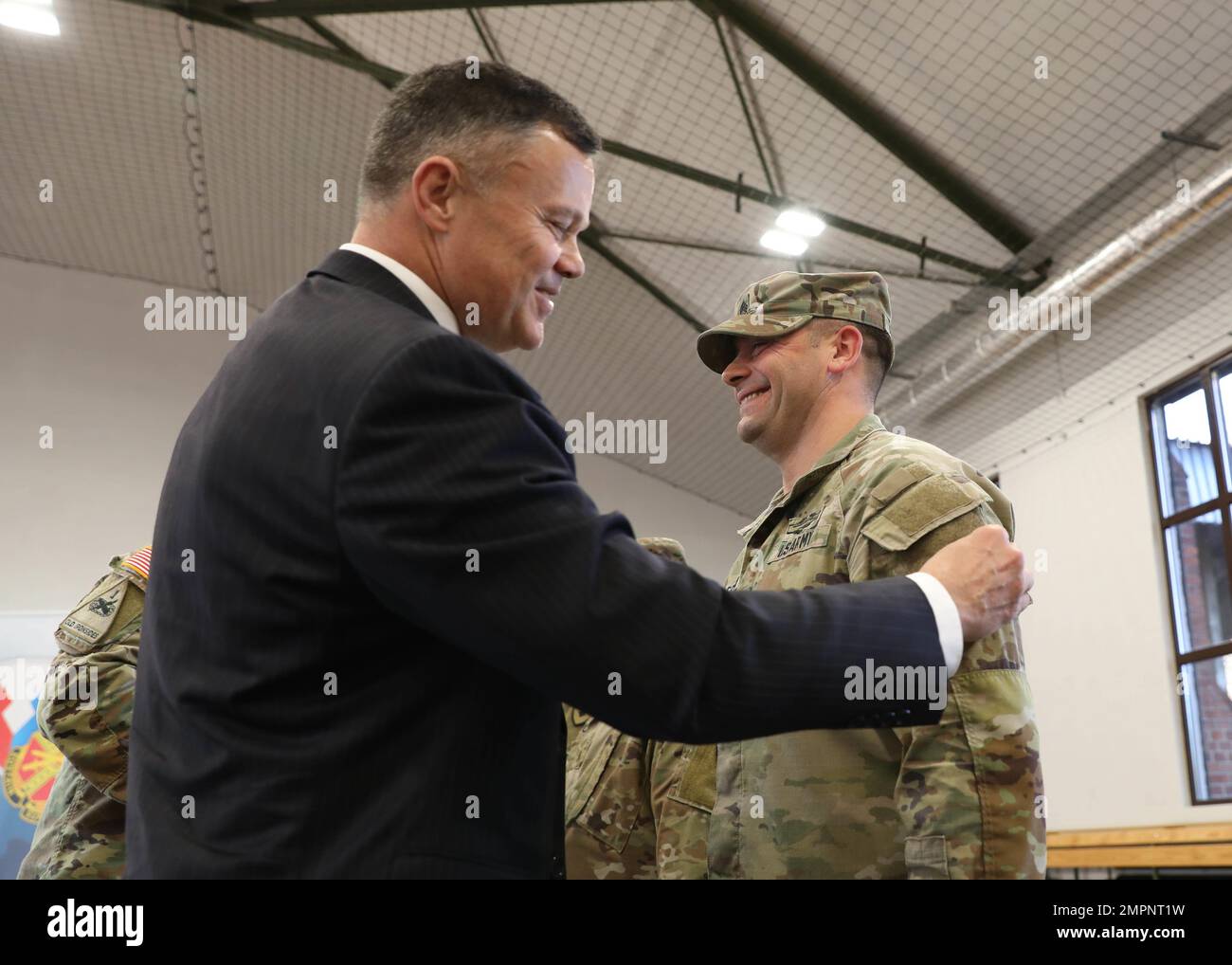 Mr. Tommy R. Mize, left, director, Installation Management Command ...