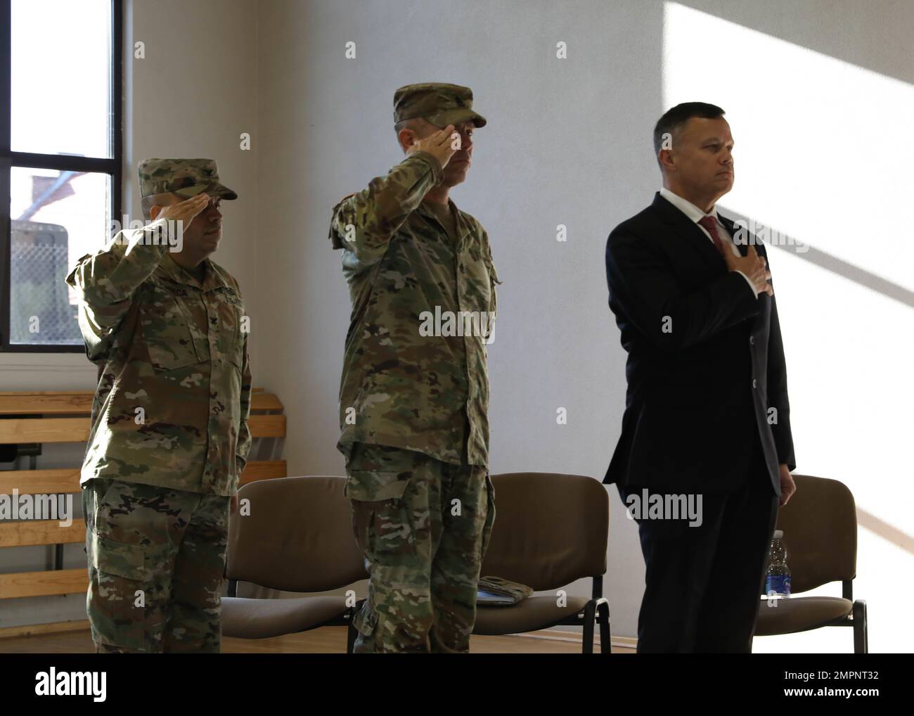 U.S. Army Col. Jorge M. Fonseca, left, commander, Area Support Group ...