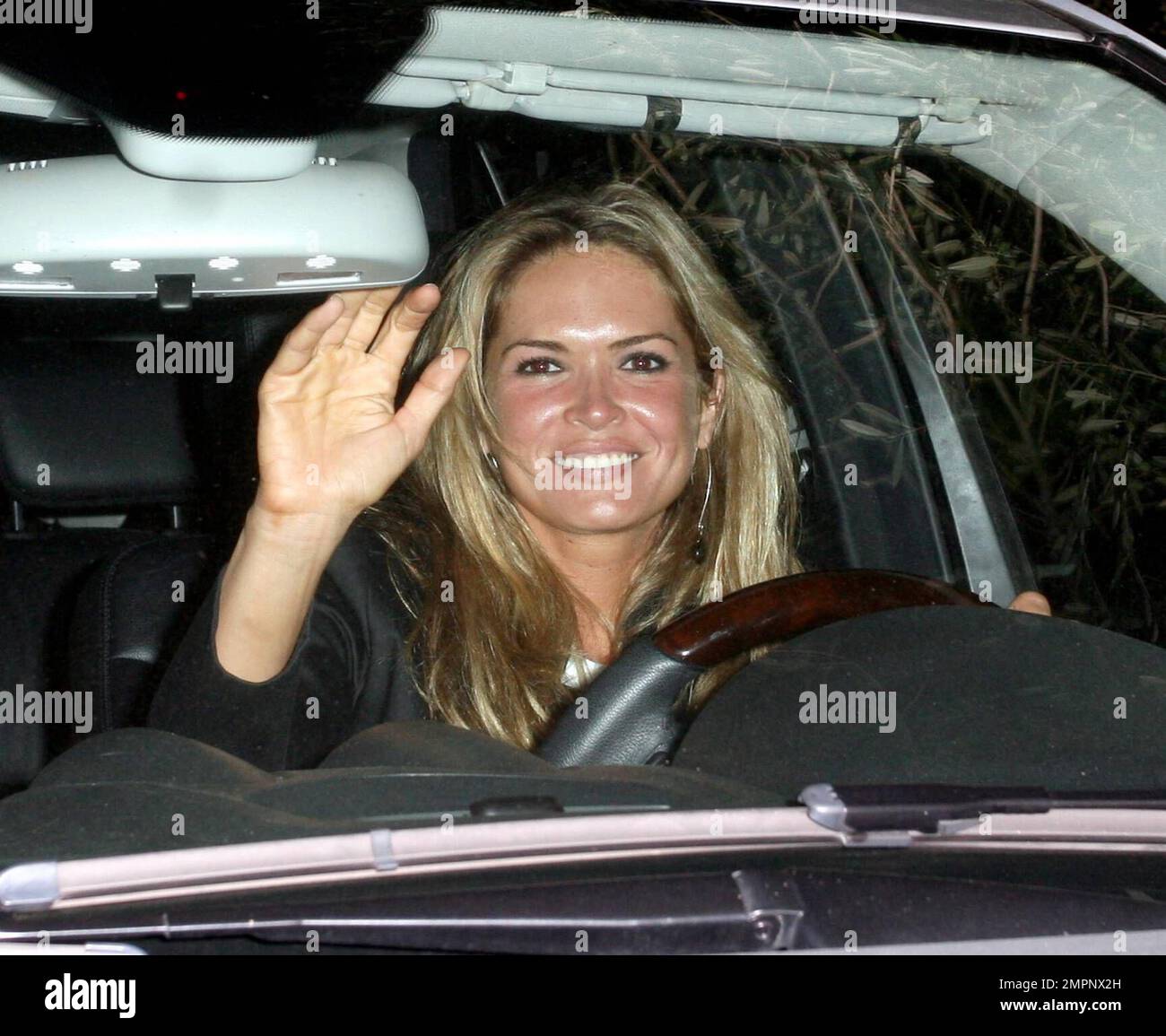 Exclusive!! Cindy Taylor leaves AGO with a friend in a wheelchair. Los ...