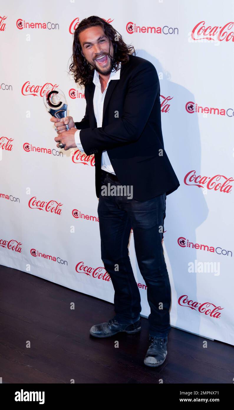 Jason Momoa poses for photographers at the 2011 CinemaCon Big Screen ...