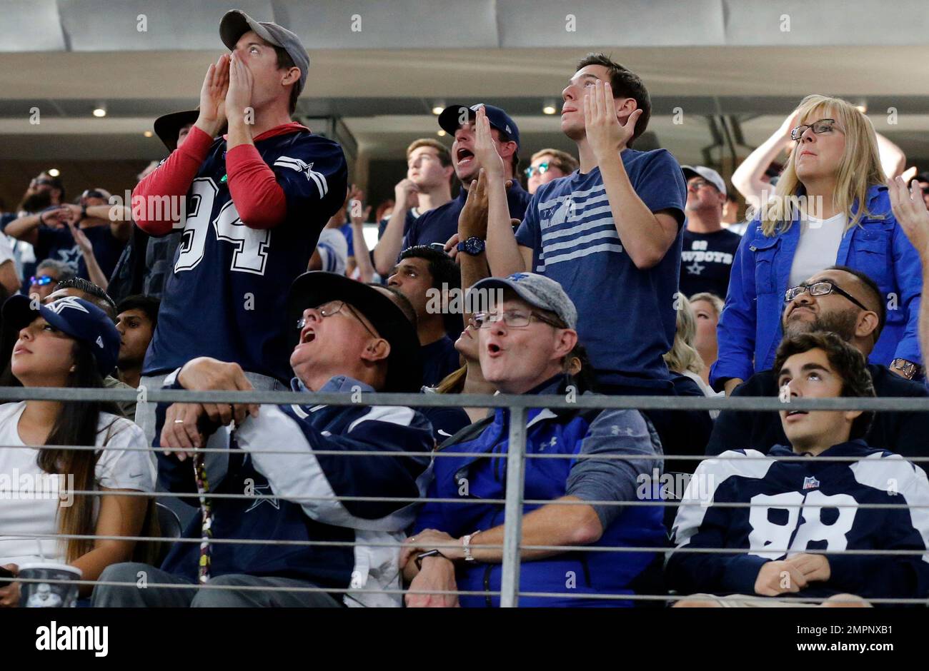 Dallas Cowboys fans boo during an NFL football game against the Los ...