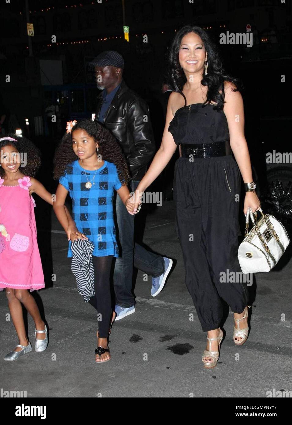 Kimora Lee Simmons, her daughters and boyfriend Djimon Hounsou attend ...