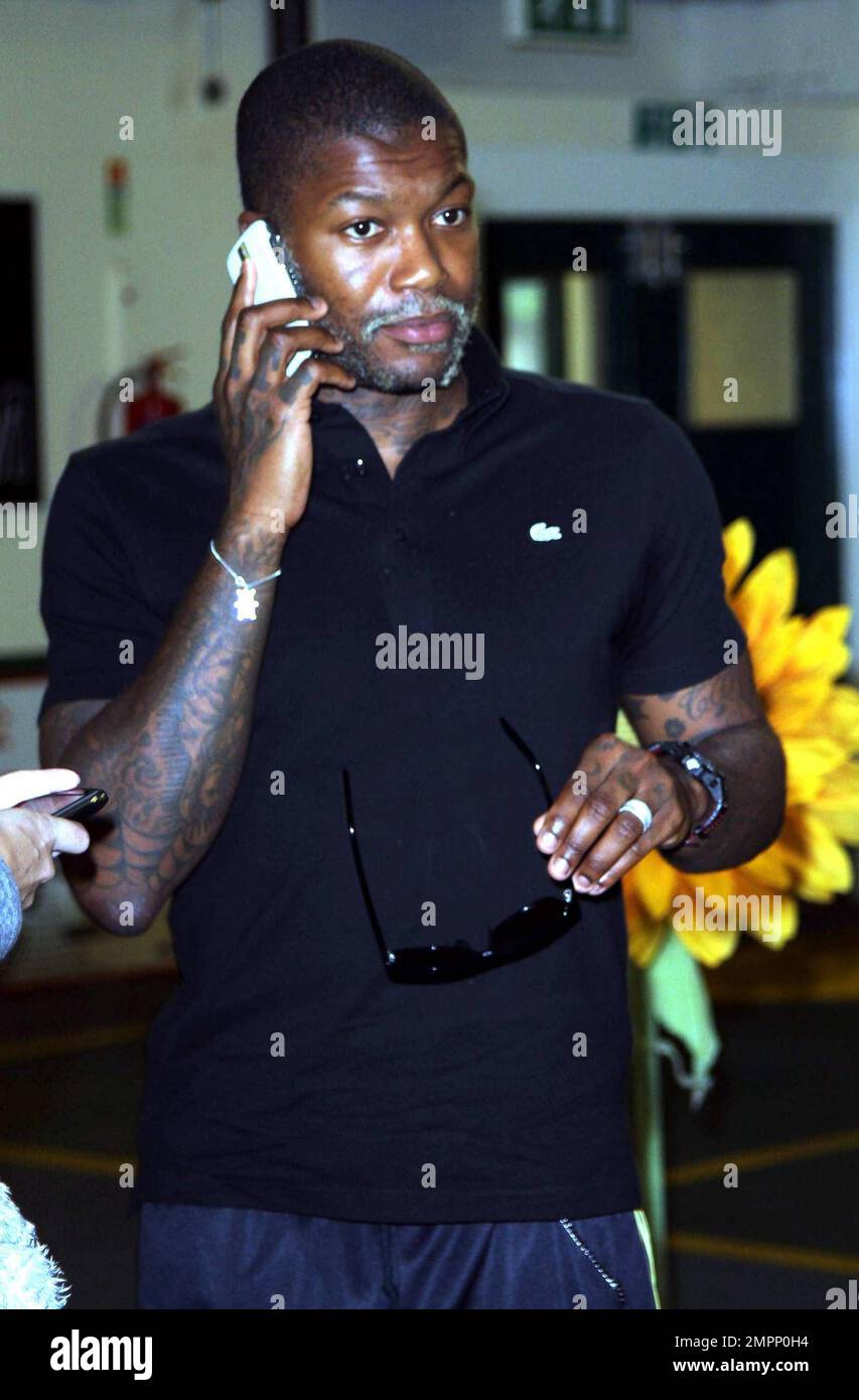 EXCLUSIVE!! French soccer player Djibril Cisse and wife Jude arrive at ...