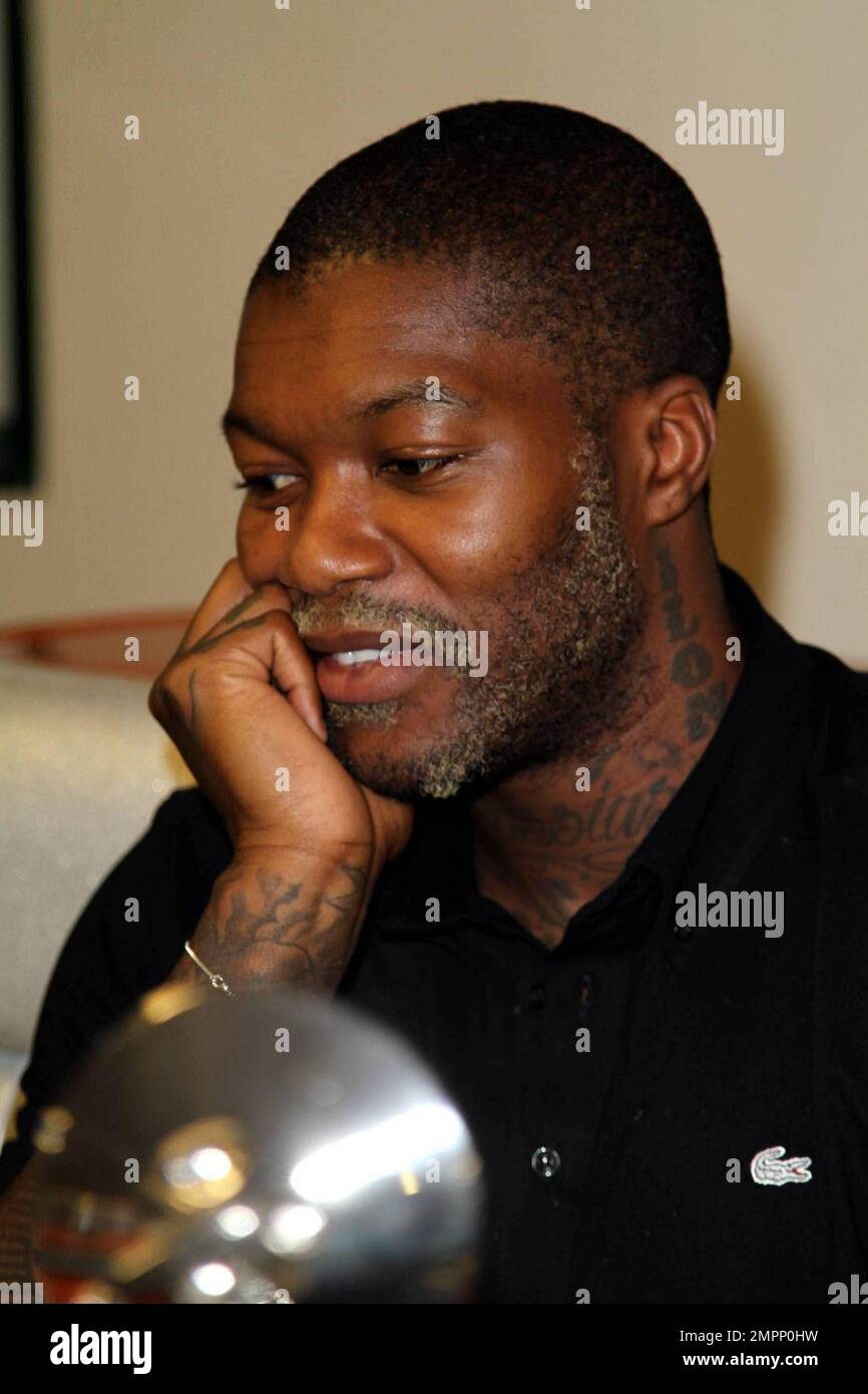EXCLUSIVE!! French soccer player Djibril Cisse and wife Jude arrive at ...