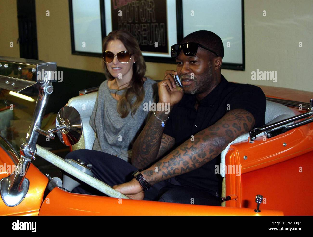 EXCLUSIVE!! French soccer player Djibril Cisse and wife Jude arrive at ...