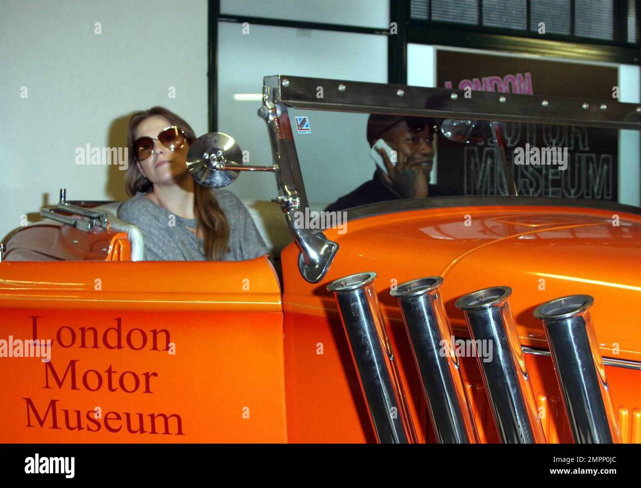 EXCLUSIVE!! French soccer player Djibril Cisse and wife Jude arrive at ...