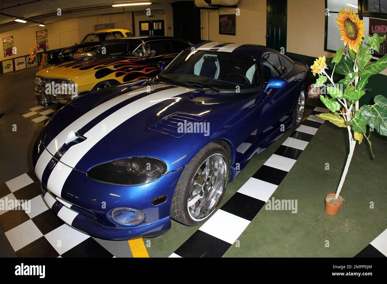 EXCLUSIVE!! French soccer player Djibril Cisse and wife Jude arrive at ...