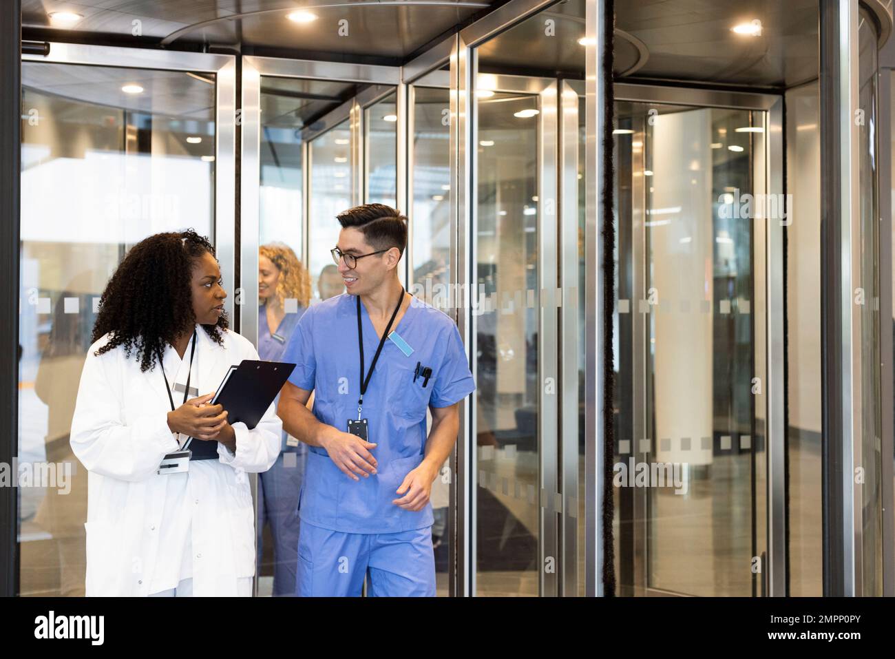 Walk through revolving door hi-res stock photography and images - Alamy