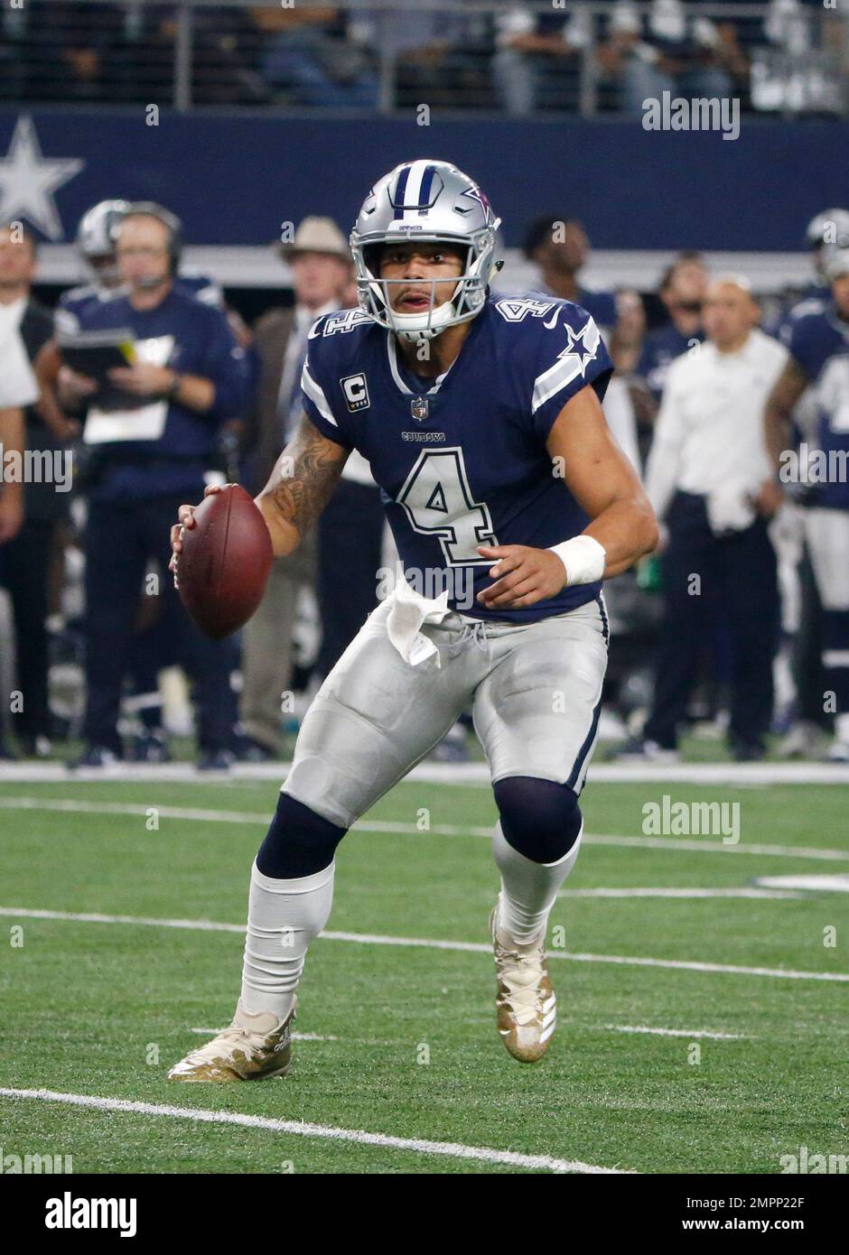 Dallas Cowboys quarterback Dak Prescott (4) looks before throwing a ...