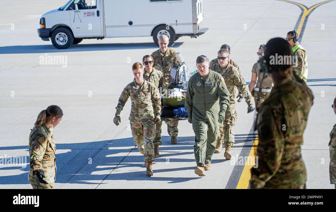 Air Force Senior Airman Andrea Plaugher (middle left), and Tech. Sgt ...