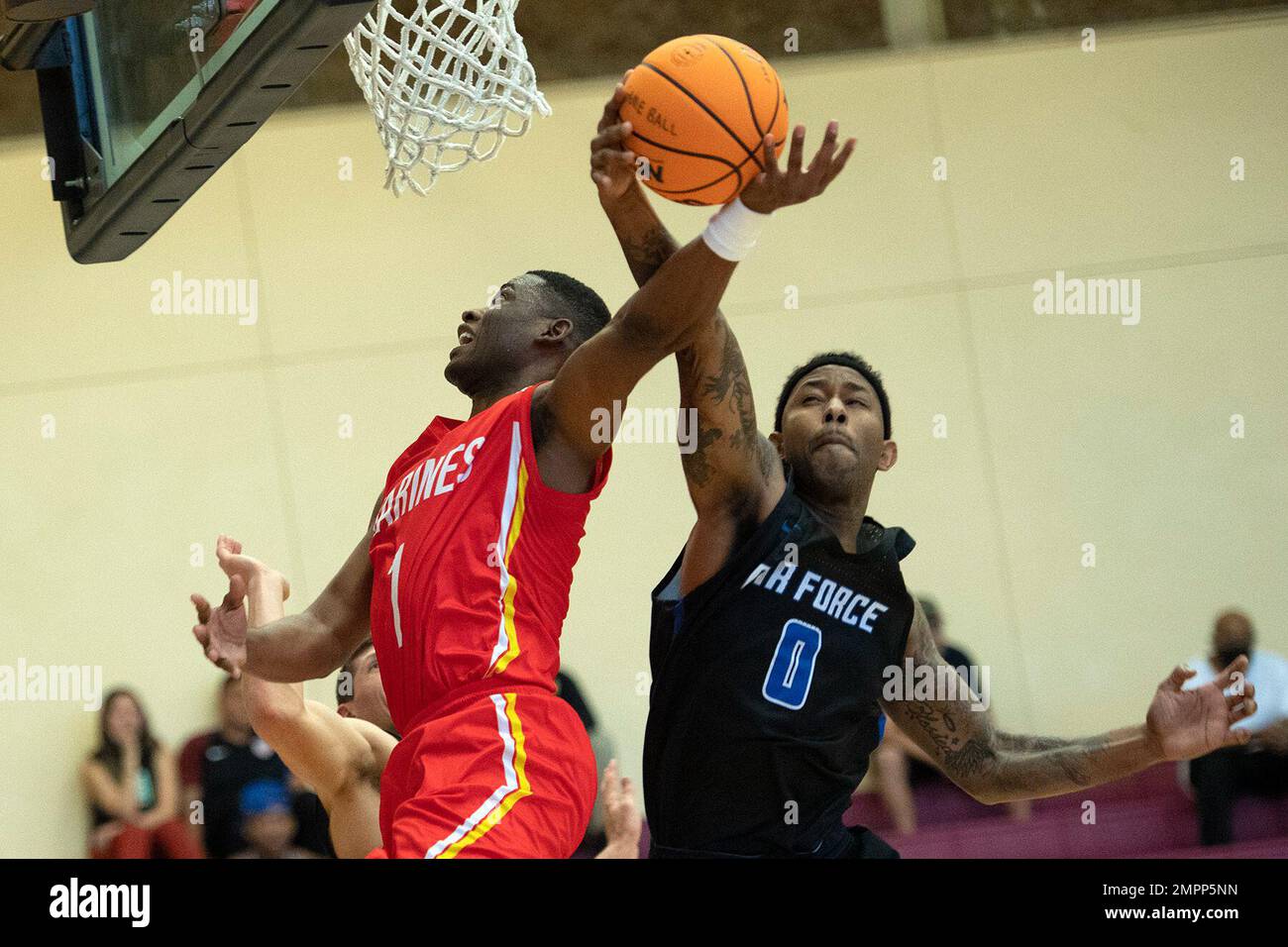 Air Force Staff Sgt. Darian Donald blocks a shot by Marine Corps ...