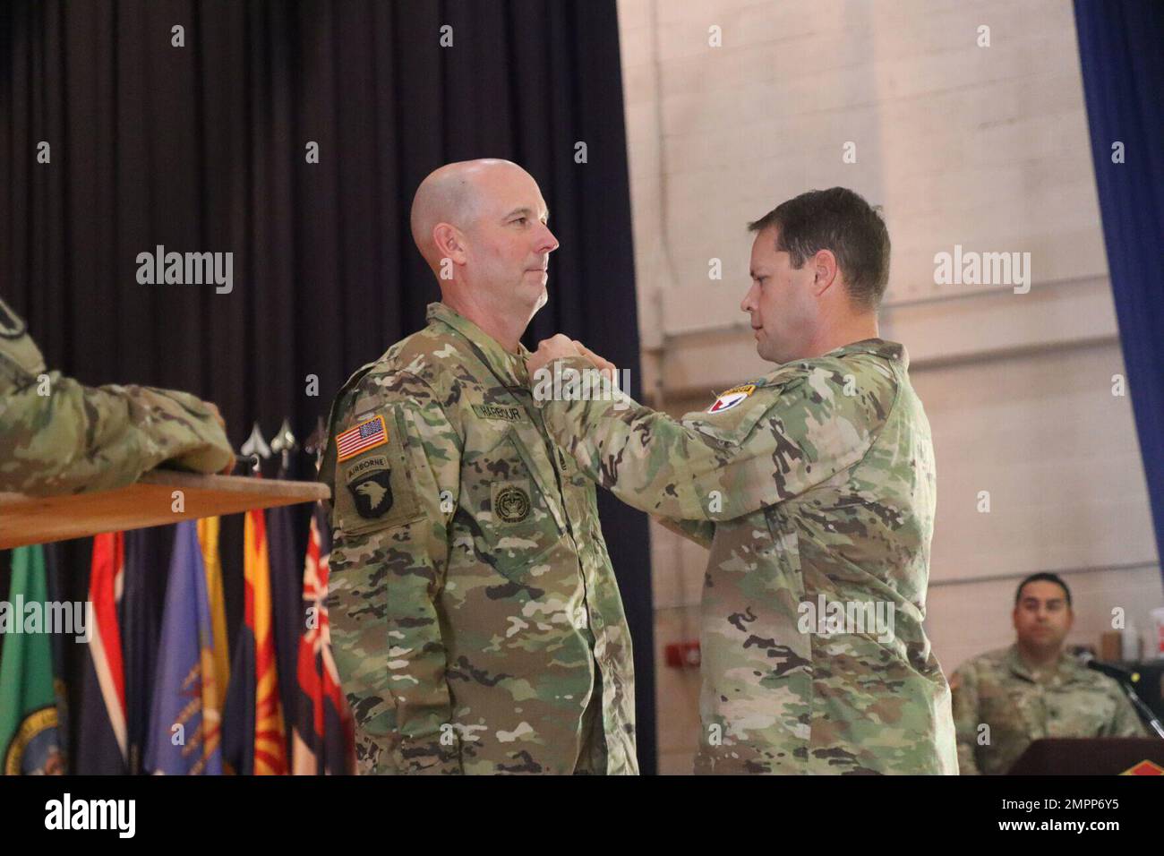 Colonel Andrew Q. Jordan, Fort Campbell garrison commander, presents ...