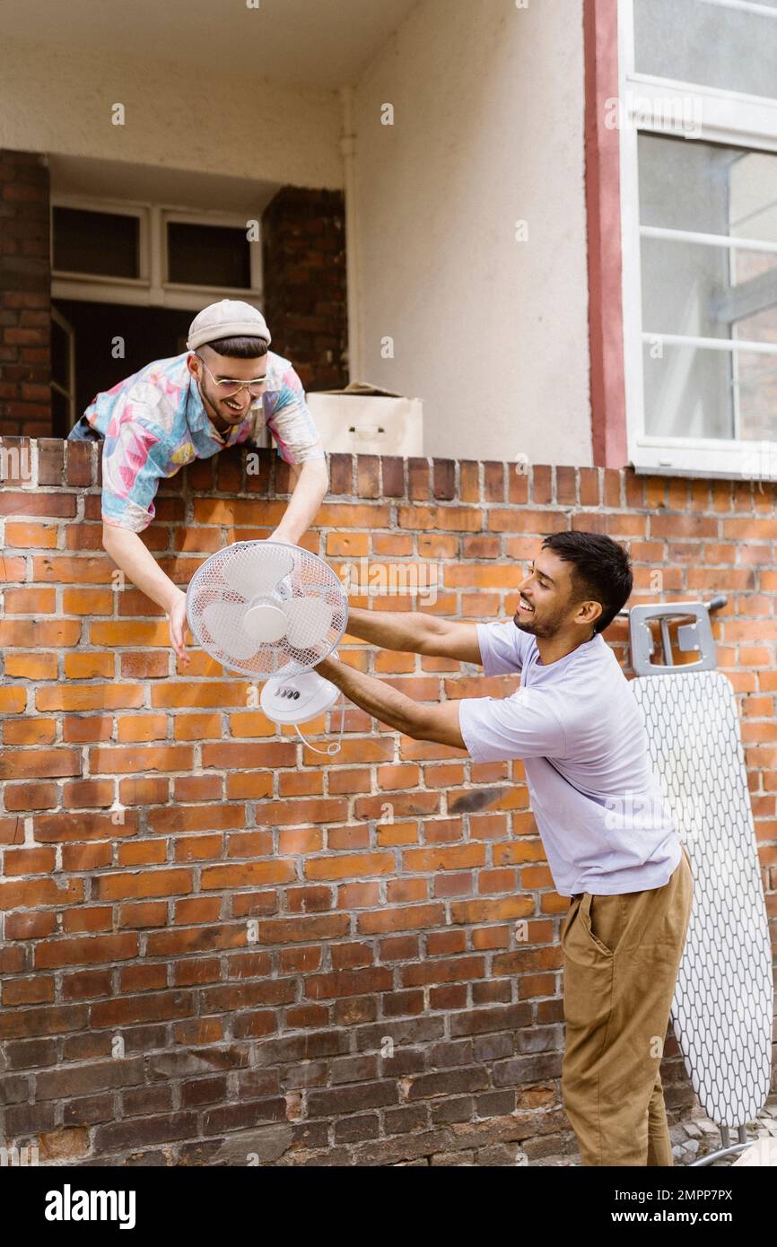Couples holding each other hi-res stock photography and images - Alamy