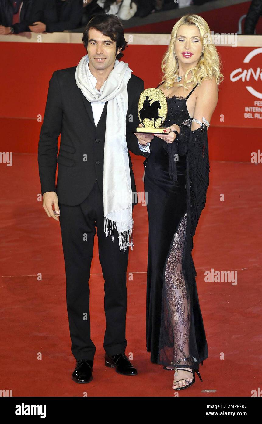 Christian Molina and Valeria Marini with the Best Film award for "Kill ...