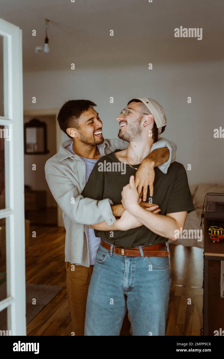 Happy gay couple looking other hi-res stock photography and images - Alamy