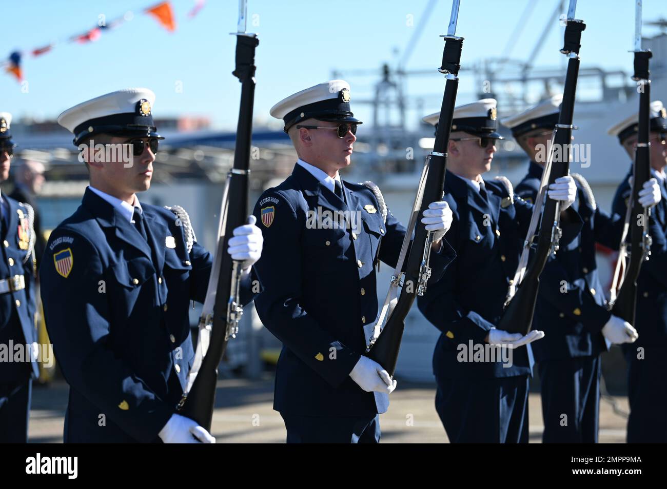 Members of the Coast Guard Ceremonial Honor Guard perform during the ...