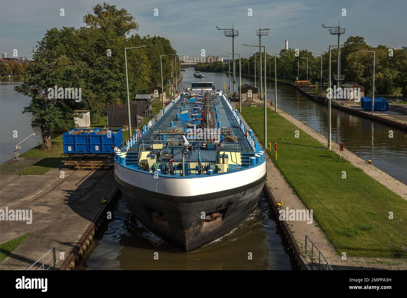 A cargo ship enters the Griesheim lock, Frankfurt, Germany Stock Photo ...
