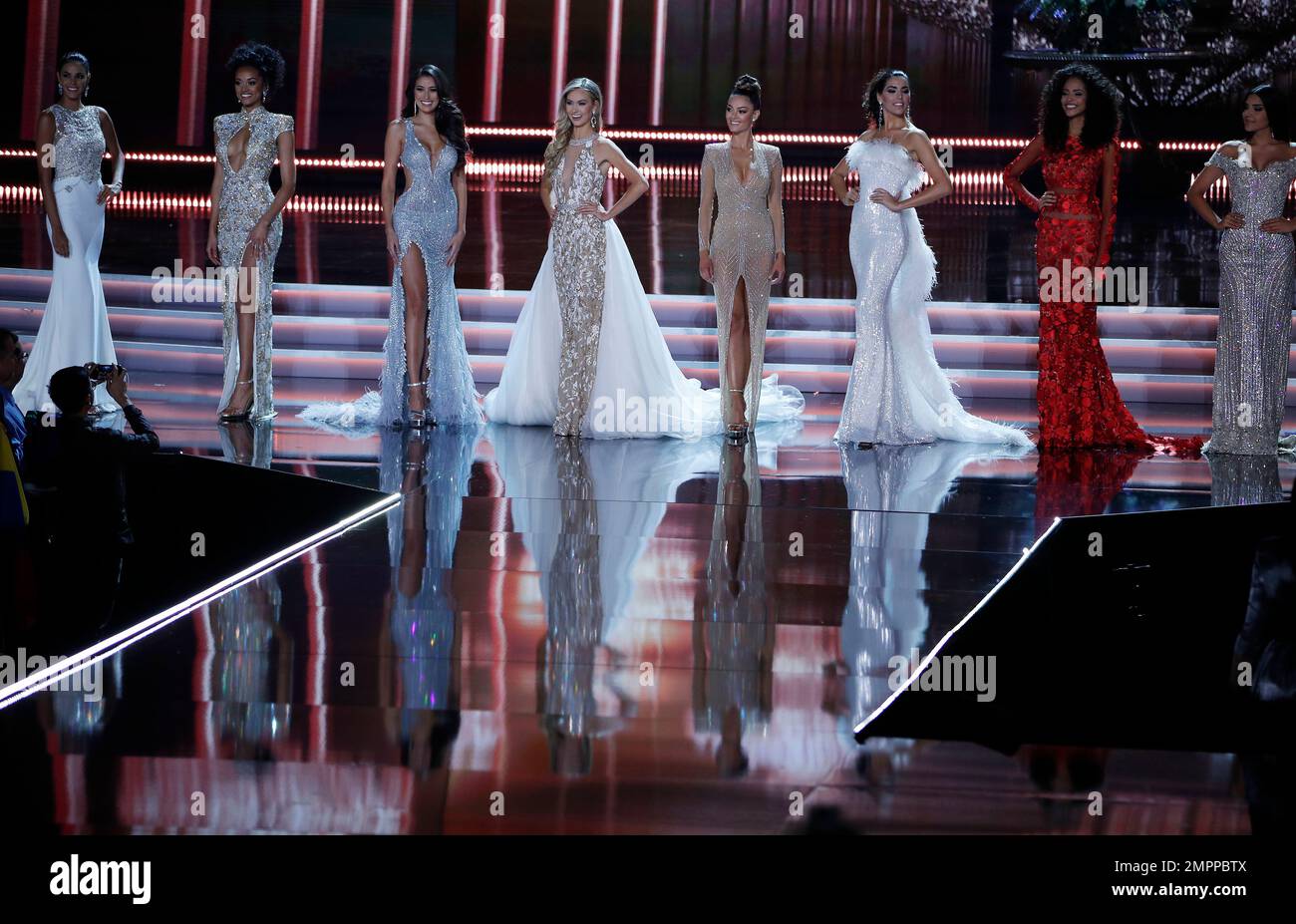 Contestants stand on stage during the Miss Universe pageant Sunday, Nov ...