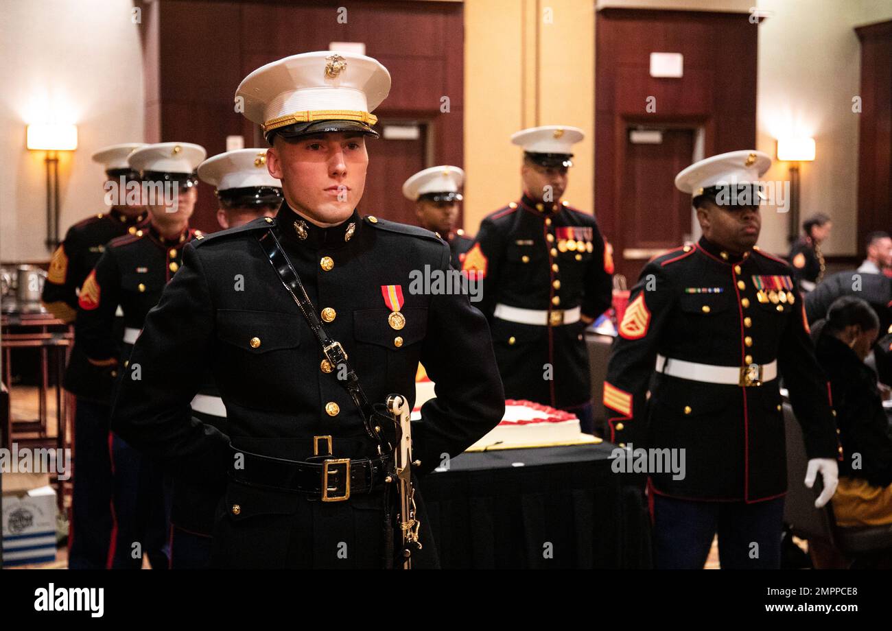 The Adjutant, 2nd Lt. Bryce Kopidlansky, prepares to sound the call at ...