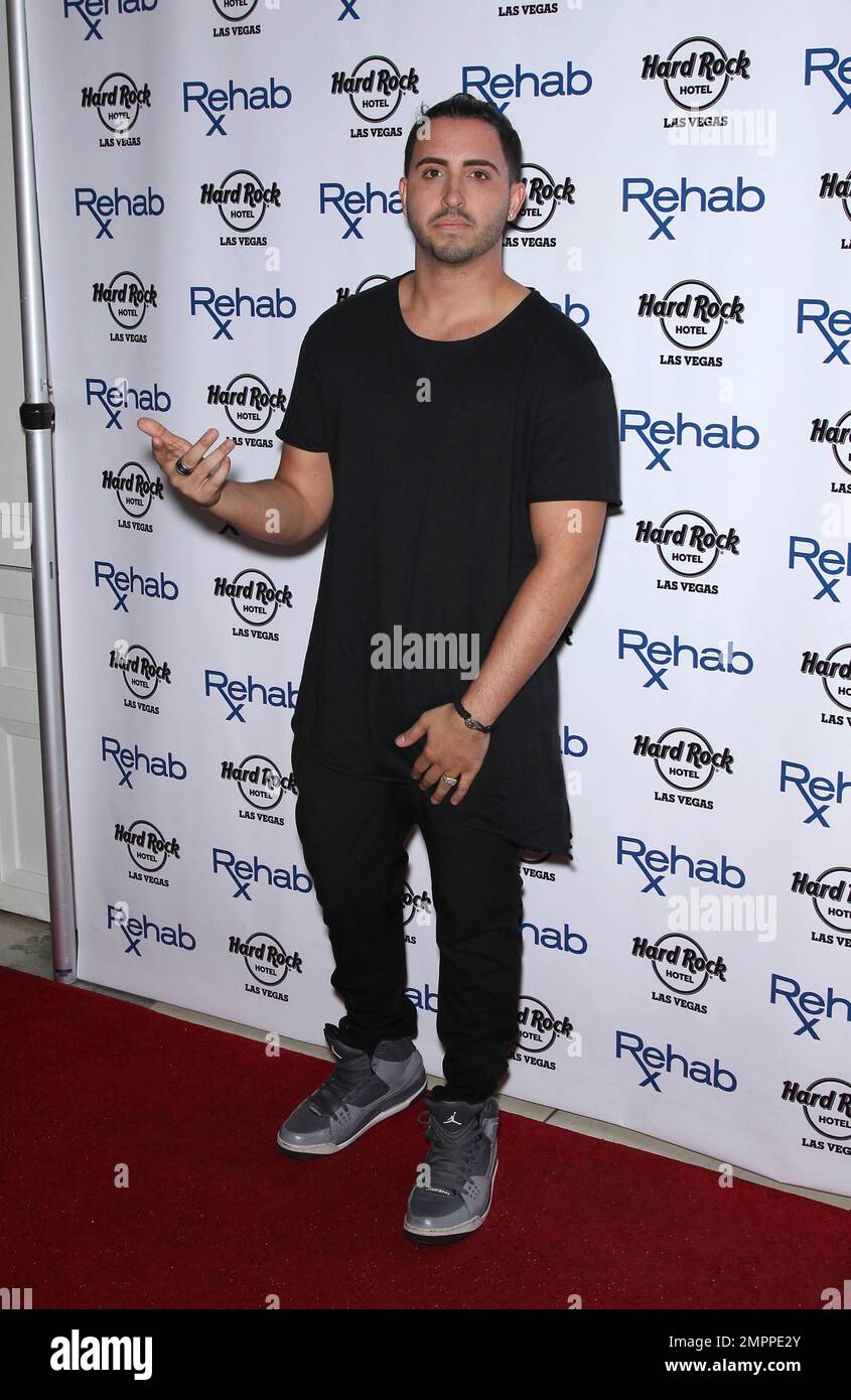 Colby O'Donis flips the bird as he walks the carpet at REHAB inside the ...