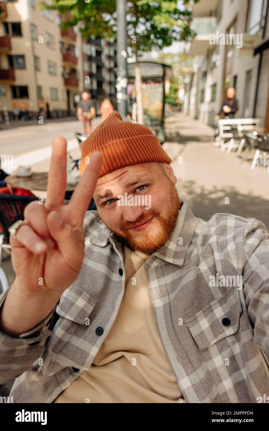 Man With Peace Sign