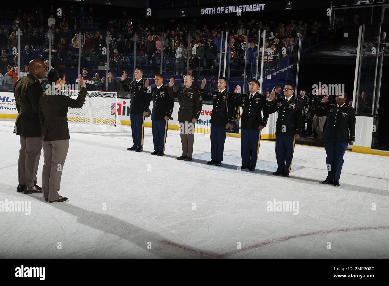 U.S. Army Soldiers with the 1st Infantry Division take the oath of ...