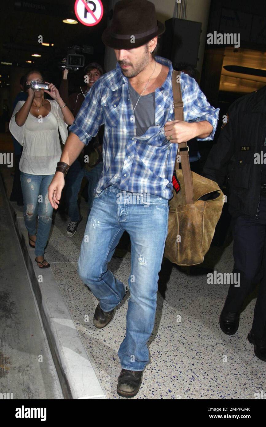 Colin Farrell arrives all smiles at LAX after a short four day break in ...
